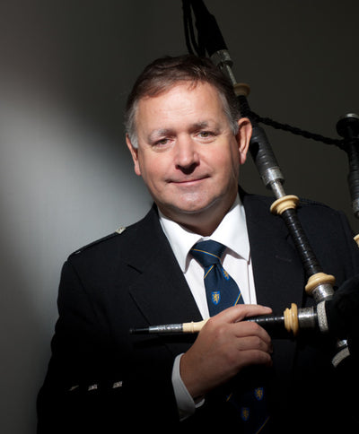 What are Bagpipers? Exploring Their Art, Attire & Impact